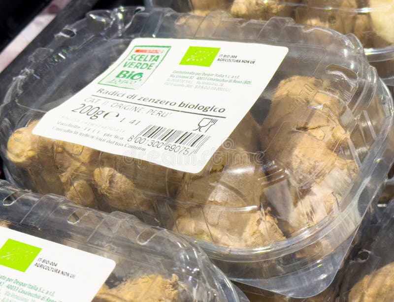 Organic Ginger Roots in Clear Plastic Packaging with Label Displaying ...