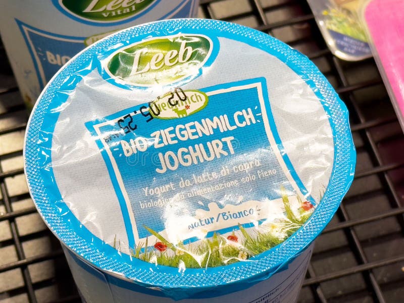Organic Goat Milk Yogurt Packaging with Blue Lid Editorial Image ...