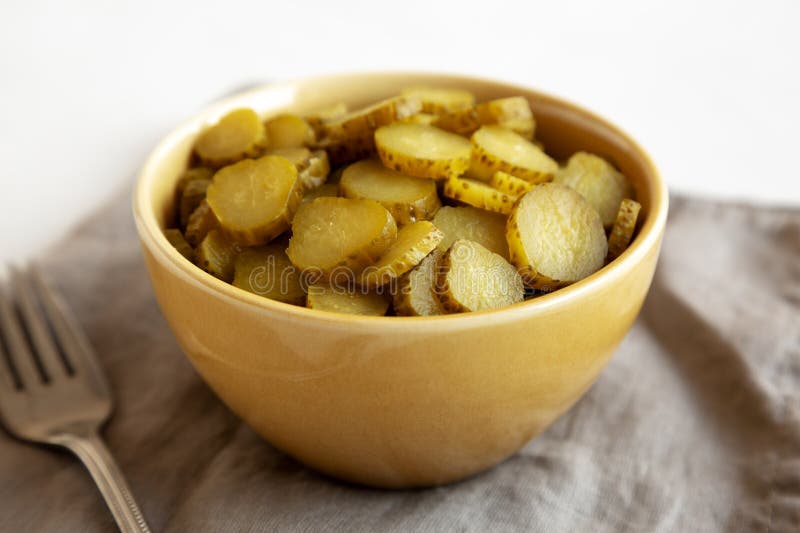 Organic Green Pickle Chips in a Bowl, Side View Stock Photo - Image of ...