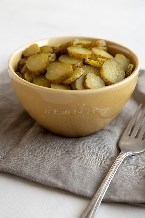 Organic Green Pickle Chips in a Bowl, Side View Stock Image - Image of ...