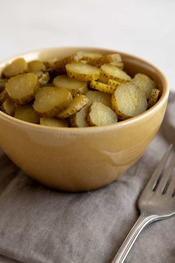 Organic Green Pickle Chips in a Bowl, Side View Stock Photo - Image of ...