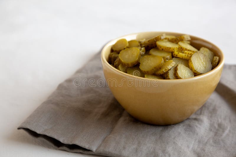 Organic Green Pickle Chips in a Bowl, Side View. Copy Space Stock Photo ...