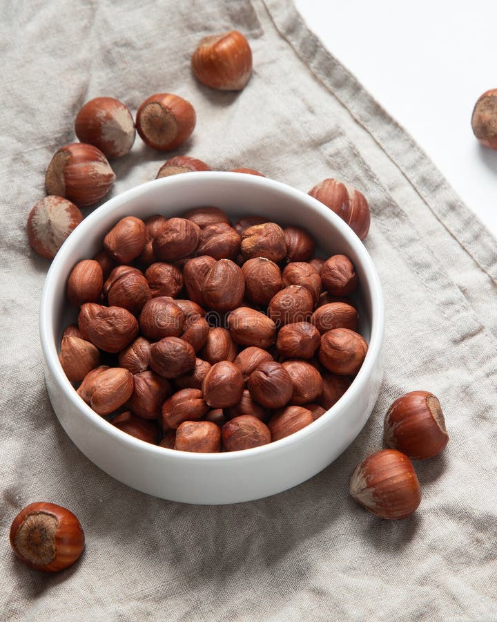 Organic hazelnut in bowl stock image. Image of filbert - 209837473