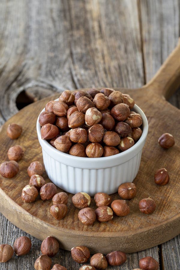 Organic Hazelnut. Hazelnuts on Wood Background. Close Up Stock Photo ...
