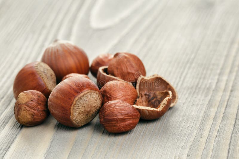 Organic Hazelnuts on Wood Table Stock Image - Image of food, nutshell ...