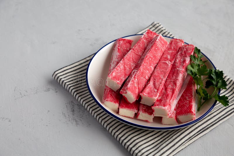 Organic Imitation Crab Meat Sticks on a Plate, Side View Stock Photo ...
