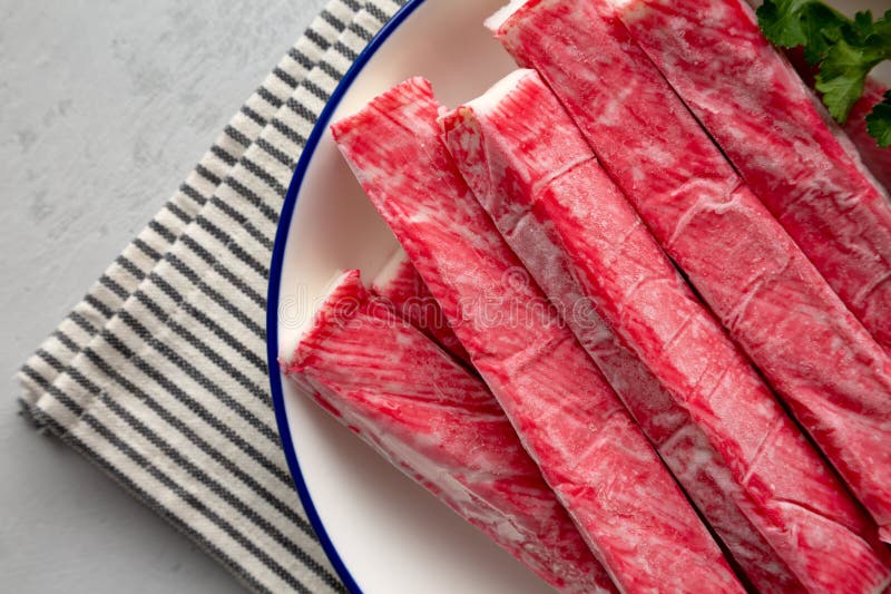 Organic Imitation Crab Meat Sticks on a Plate, Top View Stock Photo ...