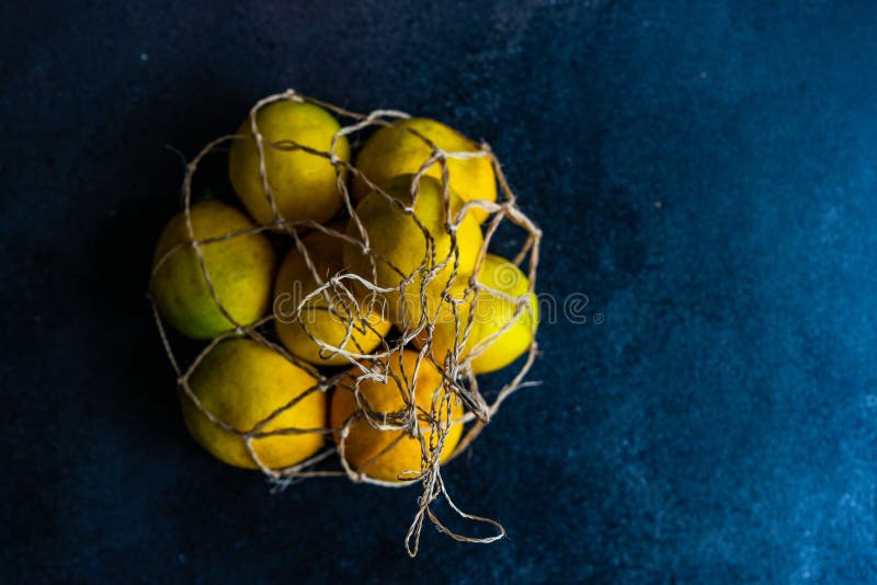 Organic Lemons in String Bag Stock Photo - Image of food, diet: 171823734
