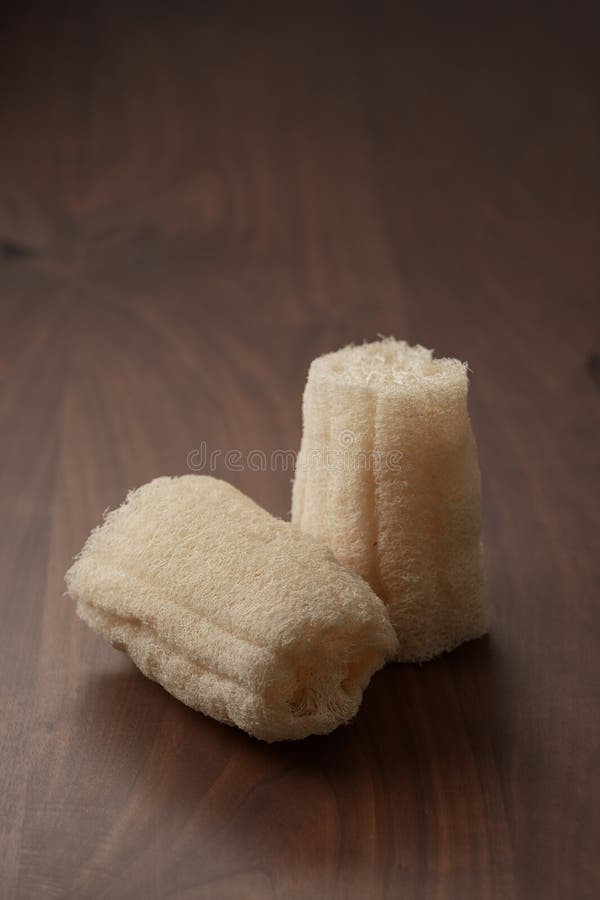 Organic Loofah Bath Scrub on Walnut Table Stock Photo - Image of wood ...