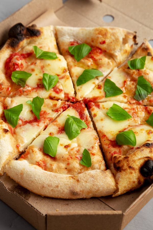 Organic Margarita Pizza with Basil and Mozarella in a Box, Side View ...