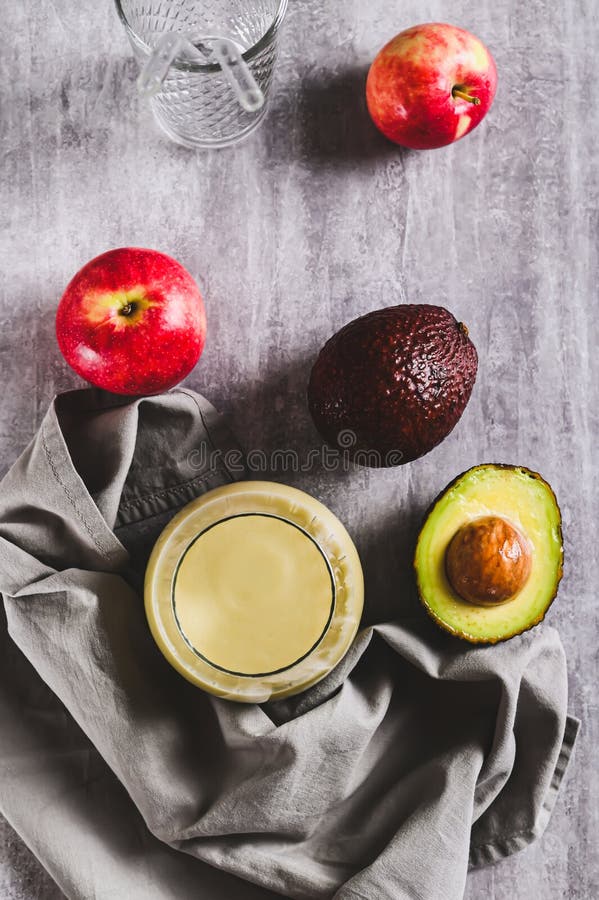 Organic Mixed Drink of Avocado, Apple and Yogurt in Glass on Table Top ...
