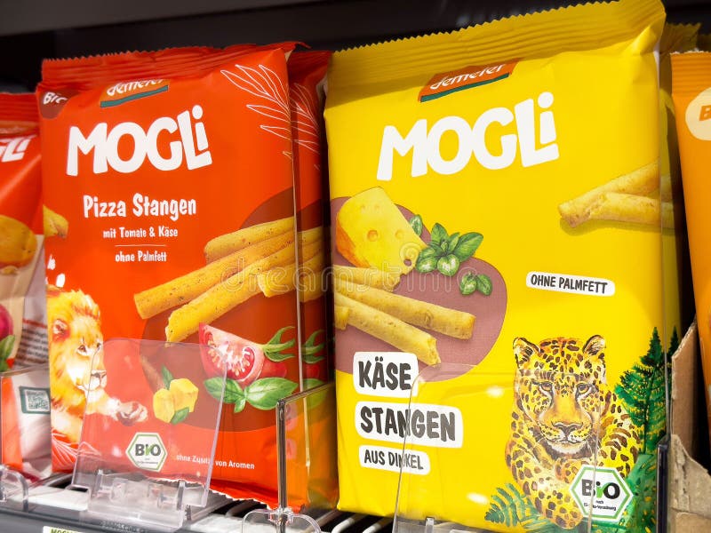 Organic Mogli Snacks Display with Tomato Cheese and Spelt Flavors ...