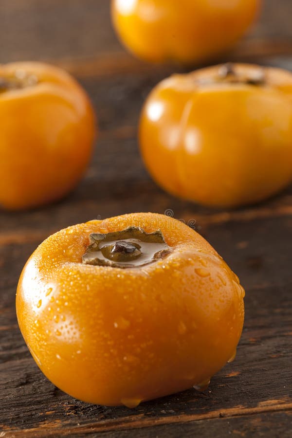Organic Orange Persimmon Fruit Stock Image - Image of yellow, vibrant ...