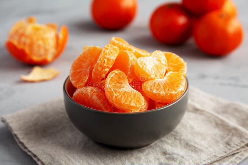 Organic Peeled Mandarin Oranges in a Bowl, Side View. Close-up Stock ...