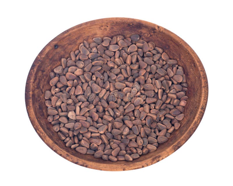 Organic Pine Nuts in Shell and Wooden Bowl Stock Photo - Image of ...