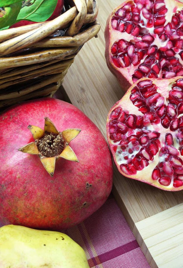 Organic Pomegranates stock image. Image of healthy, board - 53909237