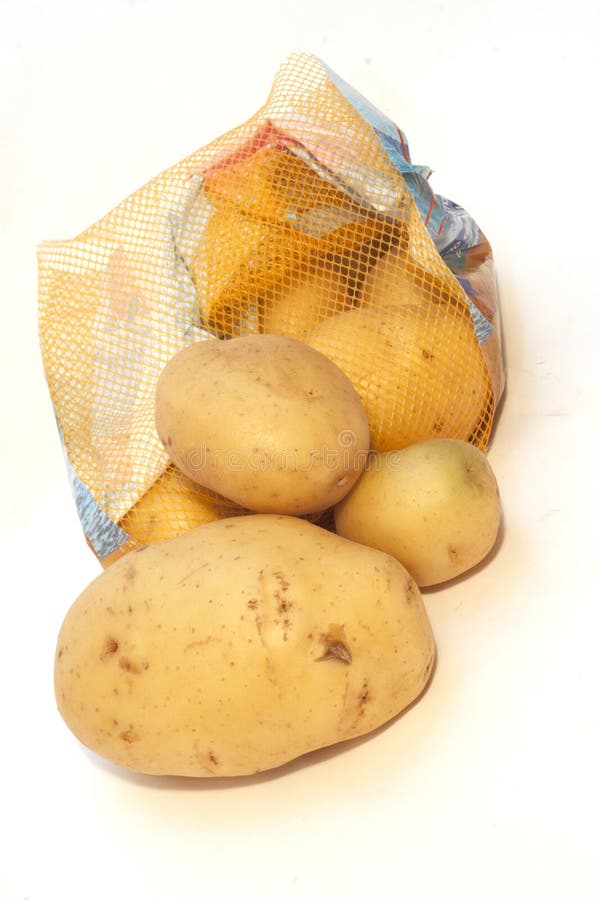 Organic Potatoes in a Net Bag Isolated on a White Background Stock ...