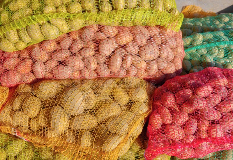 Organic Potatoes in Net Bags, Selective Focus Stock Photo - Image of ...