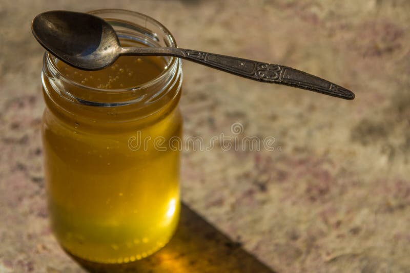 Organic Pure Honey in Jar with a Little Spoon Stock Photo - Image of ...