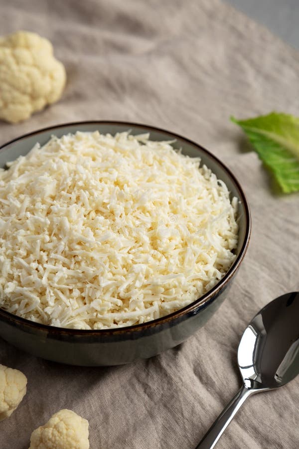 Organic Raw Cauliflower Rice in a Bowl, Side View Stock Photo - Image ...
