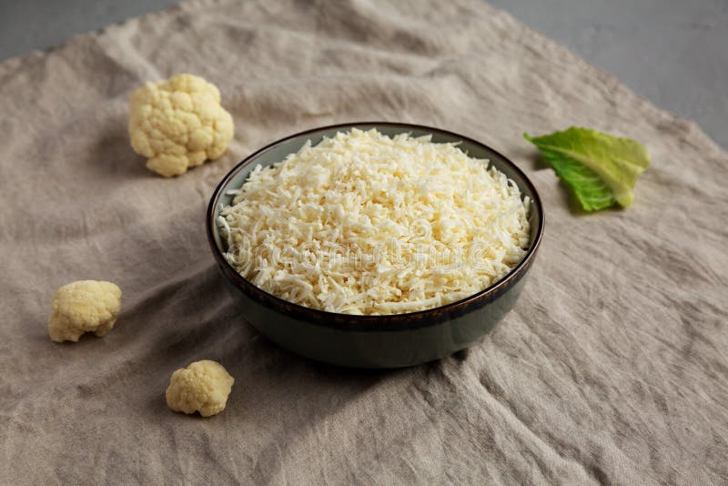 Organic Raw Cauliflower Rice in a Bowl, Side View Stock Photo - Image ...