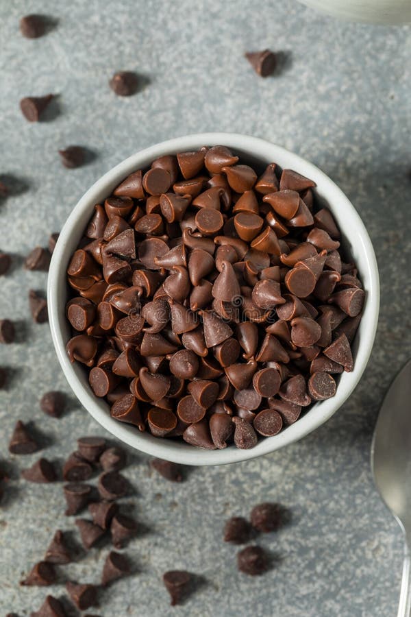 Organic Raw Mini Chocolate Chips Stock Photo - Image of dessert, mini ...