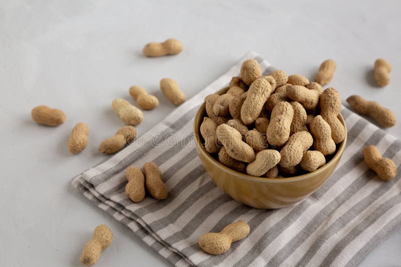 Organic Raw Peanuts in a Bowl, Side View Stock Photo - Image of snack ...
