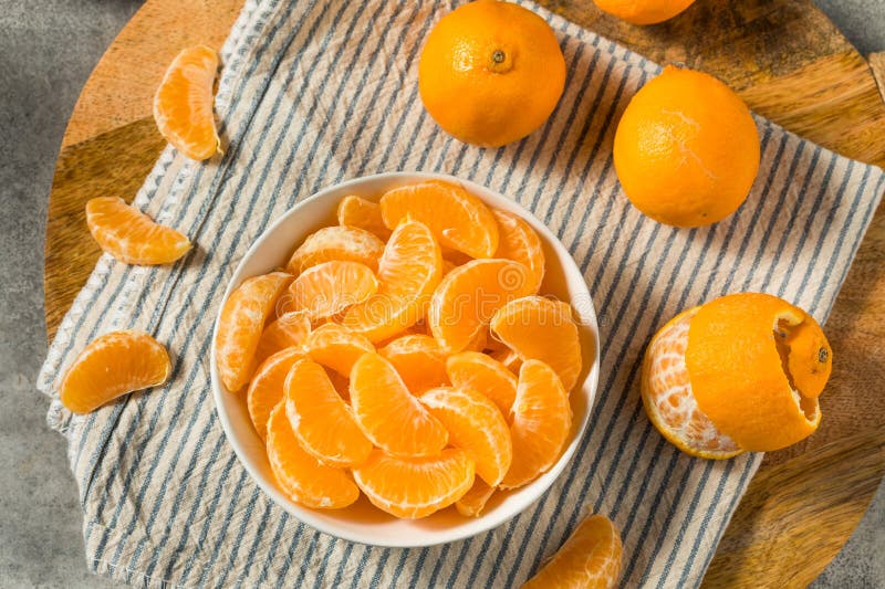 Organic Raw Peeled Mandarin Oranges Stock Image - Image of slice ...
