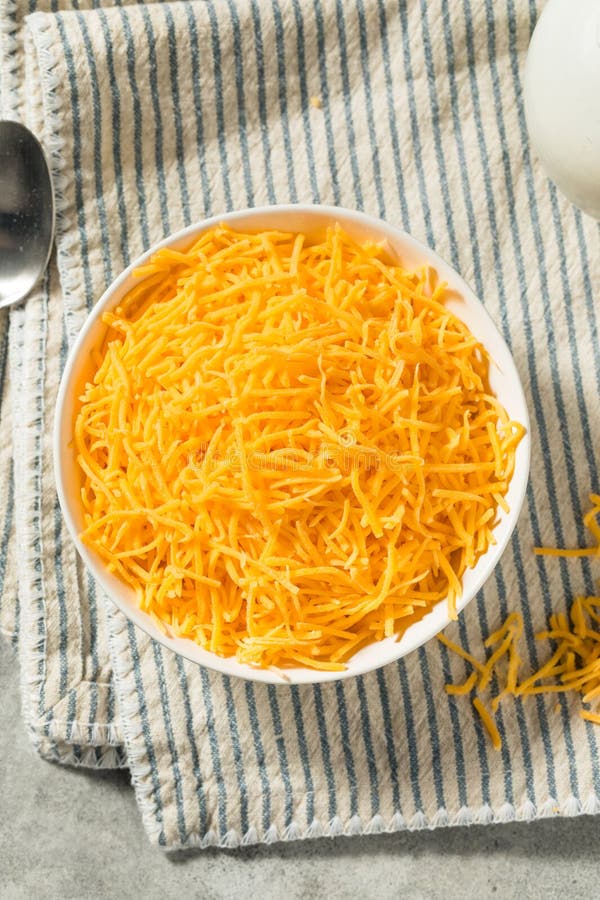 Organic Raw Shredded Cheddar Cheese Stock Photo - Image of food, mild ...