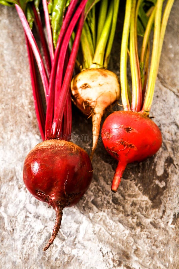 Organic Red Beets with Green Leaves on an Old Wooden Table. Rust Stock ...