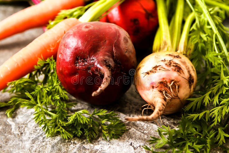 Organic Red Beets with Green Leaves on an Old Wooden Table. Rust Stock ...