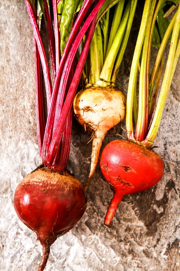 Organic Red Beets with Green Leaves on an Old Wooden Table. Rust Stock ...