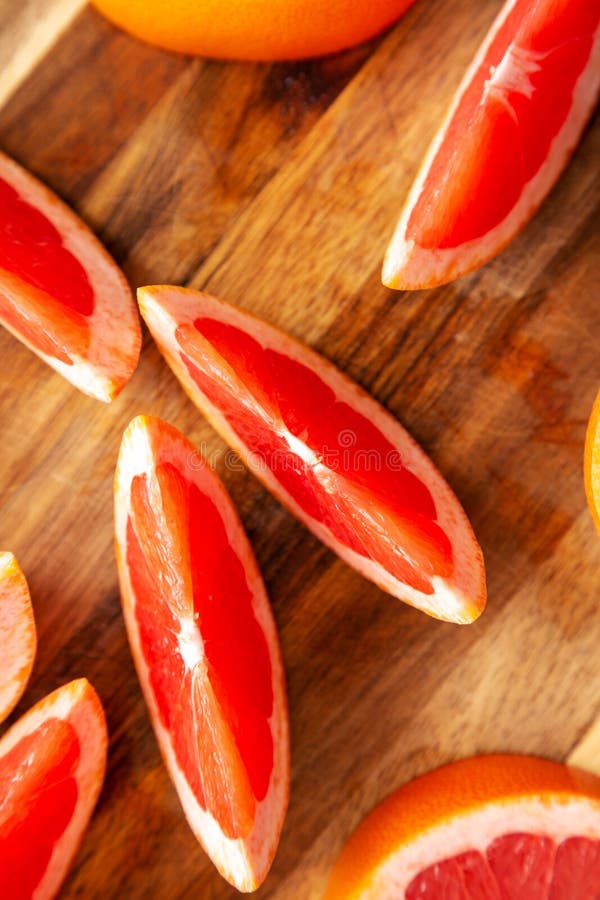 Organic Red Ruby Grapefruit on a Wooden Board, Top View. Overhead, from ...