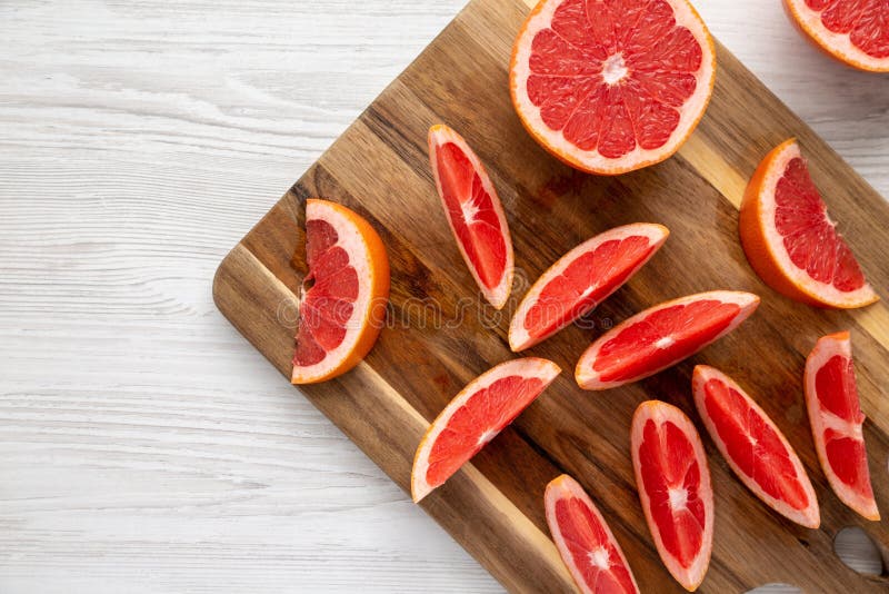 Organic Red Ruby Grapefruit on a Wooden Board, Top View. Overhead, from ...