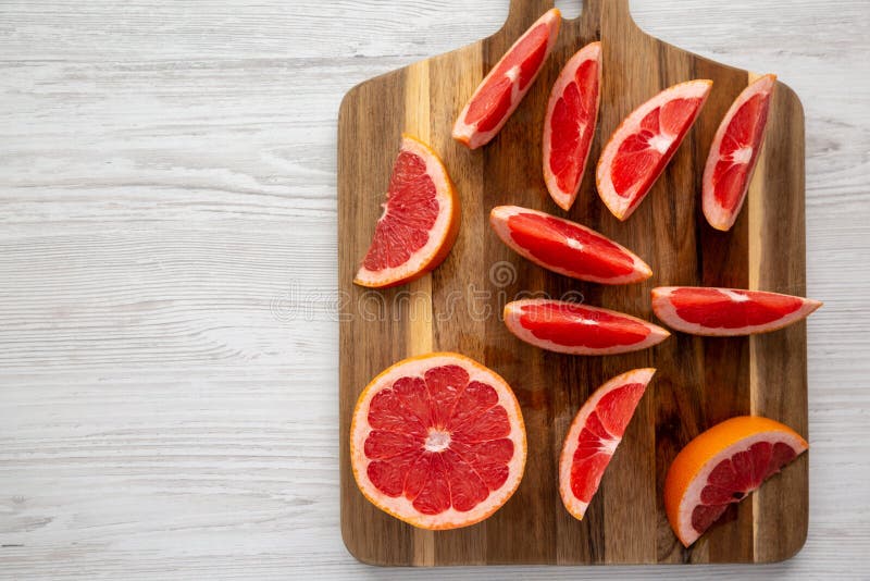 Organic Red Ruby Grapefruit on a Wooden Board, Top View. Overhead, from ...