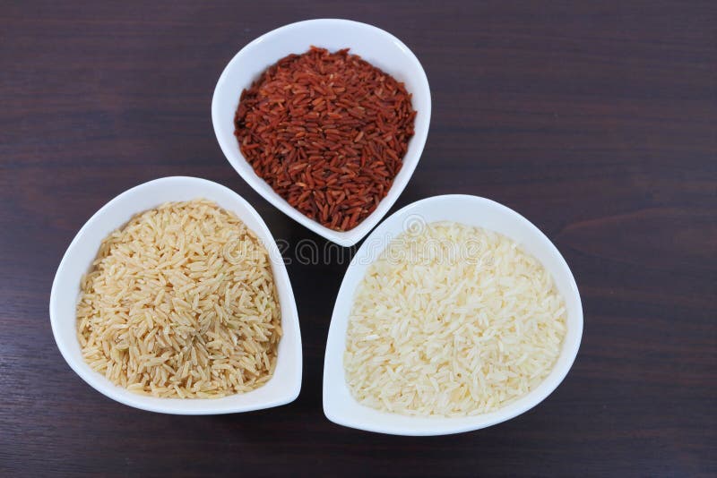 Organic rice in bowls stock photo. Image of brown, vitamin - 30437652