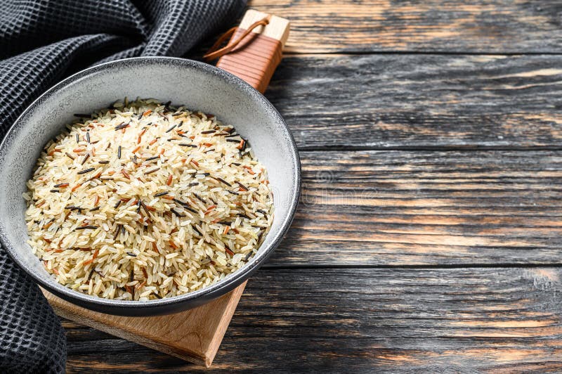 Organic Rice, Mixed Rice in a Bowl. Black Background. Top View Stock ...