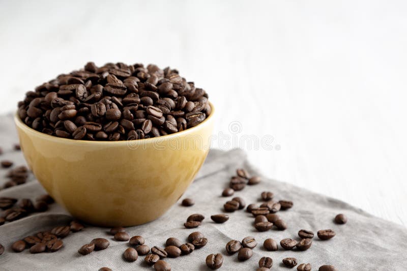 Organic Roasted Coffee Beans in a Bowl, Side View. Copy Space Stock ...