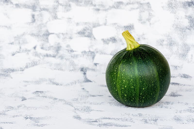 Organic Round Green Courgettes Zucchini on Gray Rustic Background Stock ...
