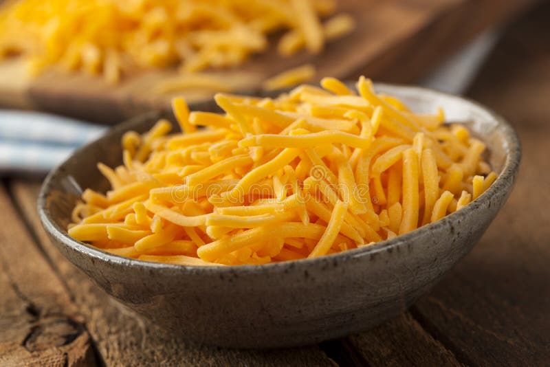 Organic Shredded Sharp Cheddar Cheese Stock Photo - Image of food ...