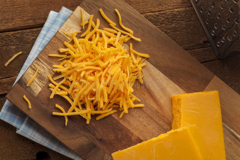 Organic Shredded Sharp Cheddar Cheese Stock Photo - Image of gourmet ...