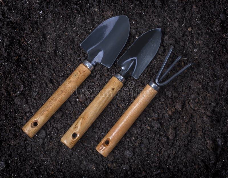 Organic soil and spade stock image. Image of garden, botany - 69906453