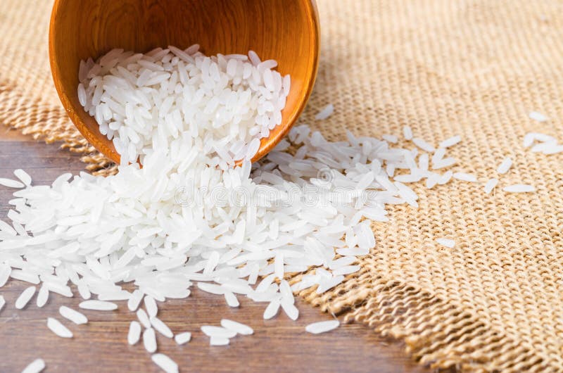 Organic Thai Jasmine Rice Grain in Wooden Bowl Stock Image - Image of ...