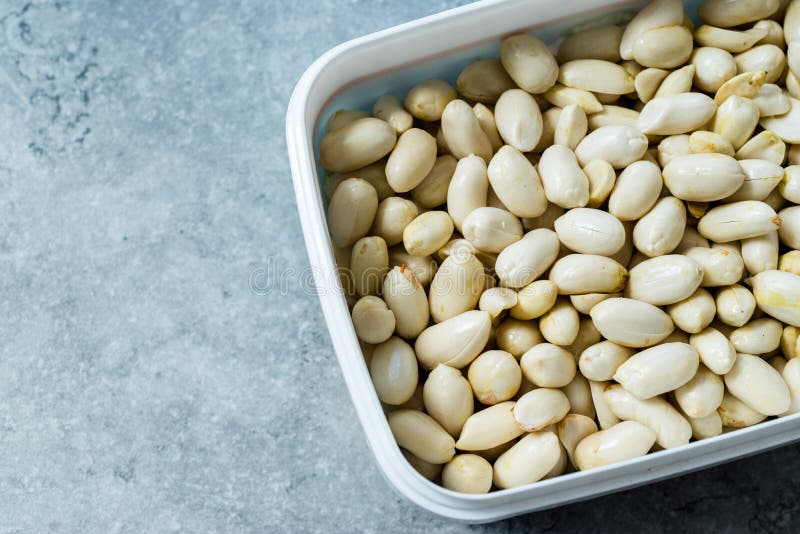 Organic Unsalted White Peeled Raw Peanuts in Plastic Box Container ...
