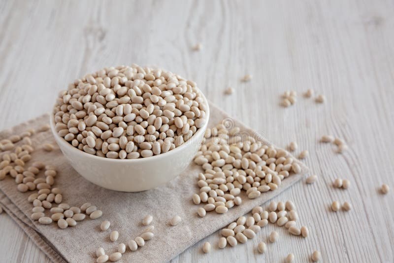 Organic White Beans in a Bowl, Side View Stock Image - Image of wood ...