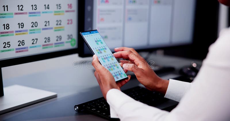 Organize Your Busy Days with Phone, Computer Stock Photo - Image of ...