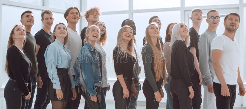 Organized Group of Casual Young People Looking Up Stock Image - Image ...