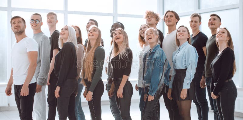 Organized Group of Casual Young People Looking Up Stock Image - Image ...