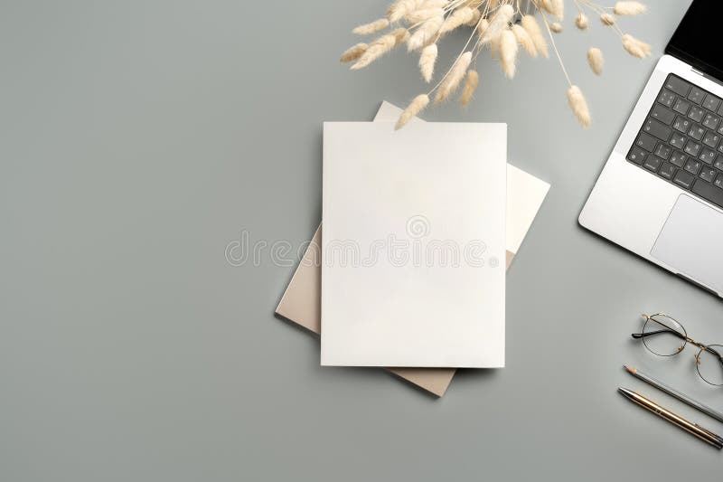 Organized Workspace Featuring Laptop and Blank Paper at Desk in Natural ...