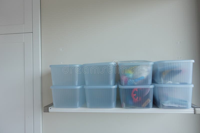 Organizing Clear Storage Containers Minimalist Shelf Stock Photos ...
